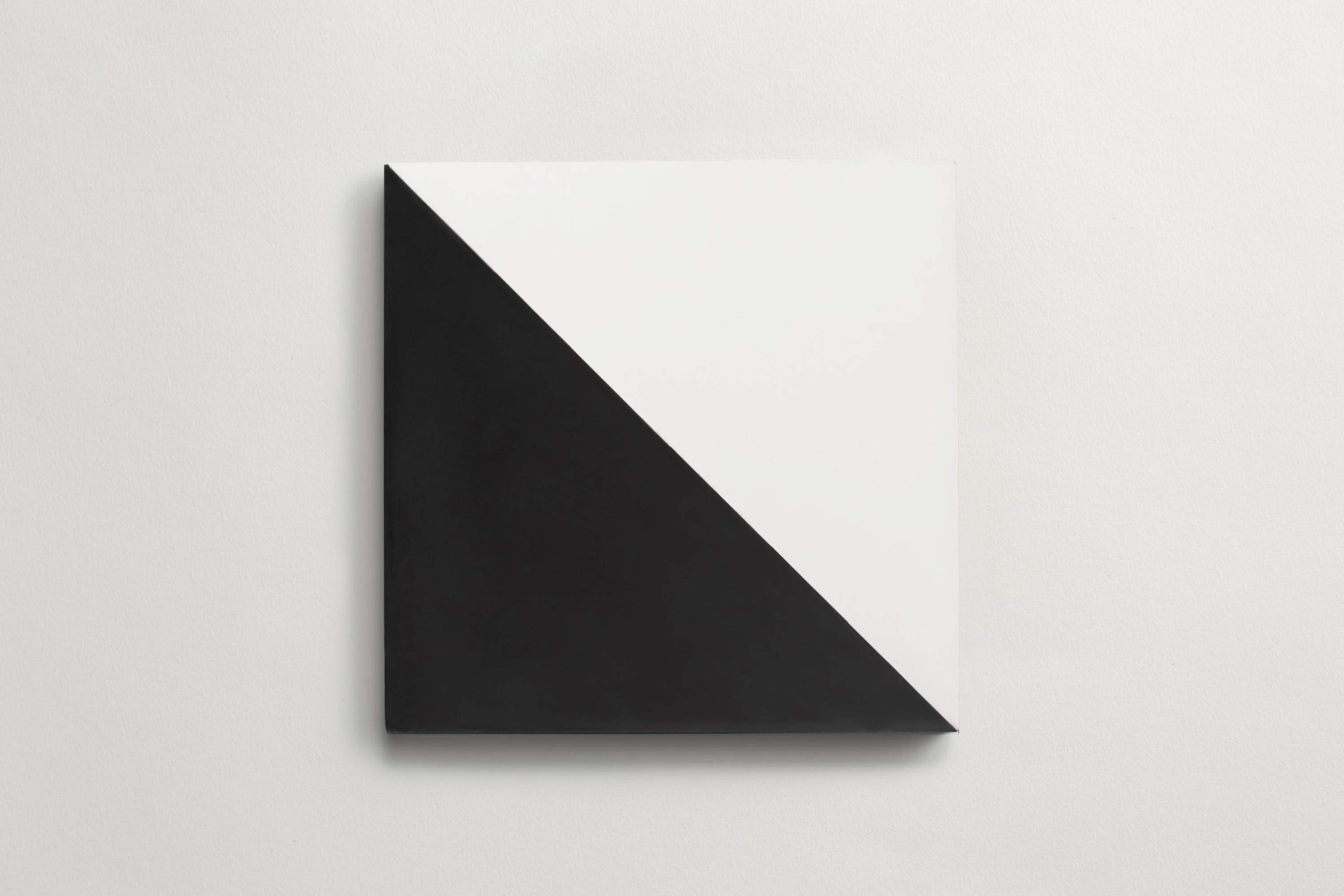 clé tile | concrete cement | bold slant triangle | black white