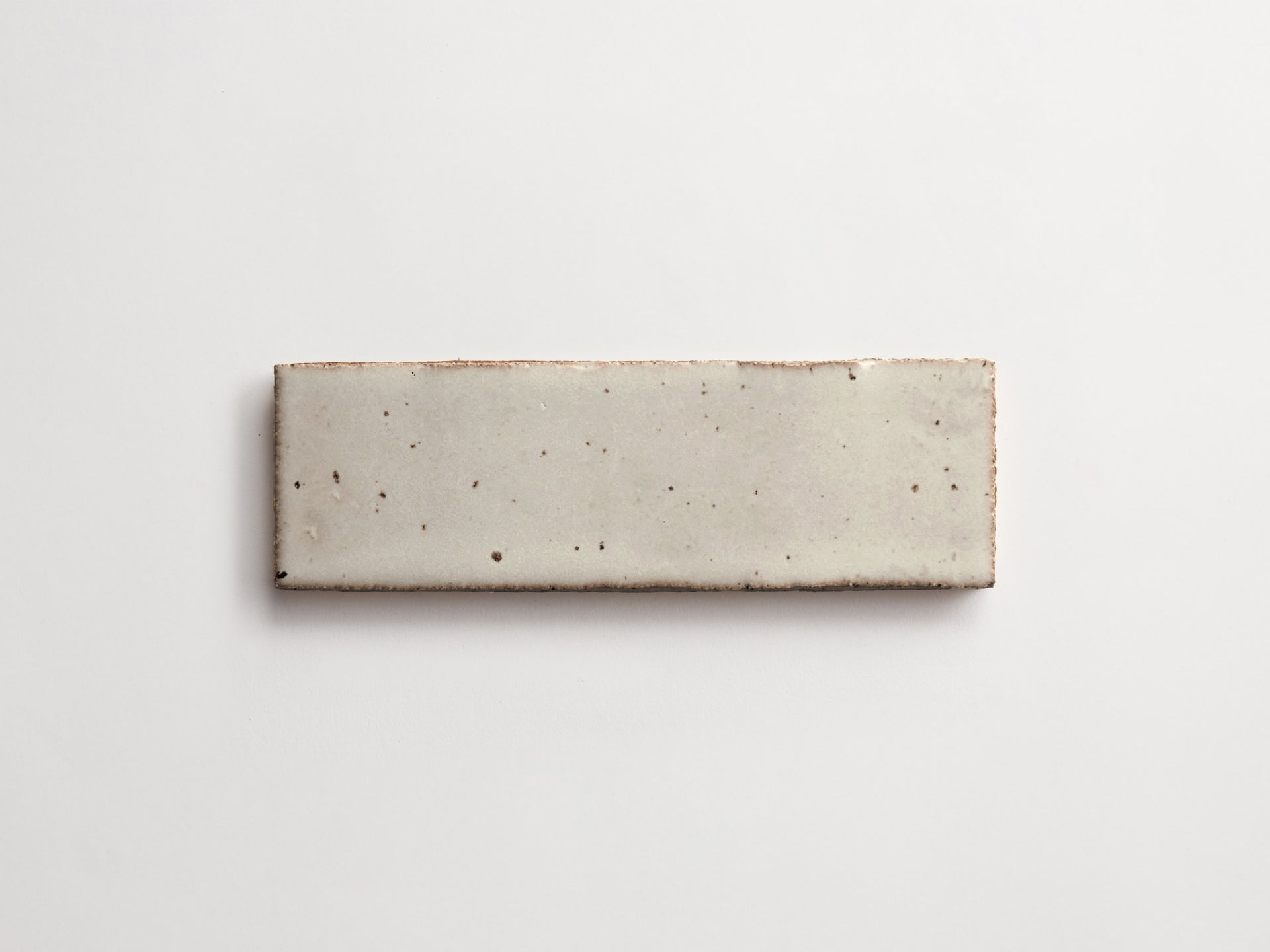 clé guild | thin glazed brick | carpenter's canvas | 8x2.5x0.5 | clé tile