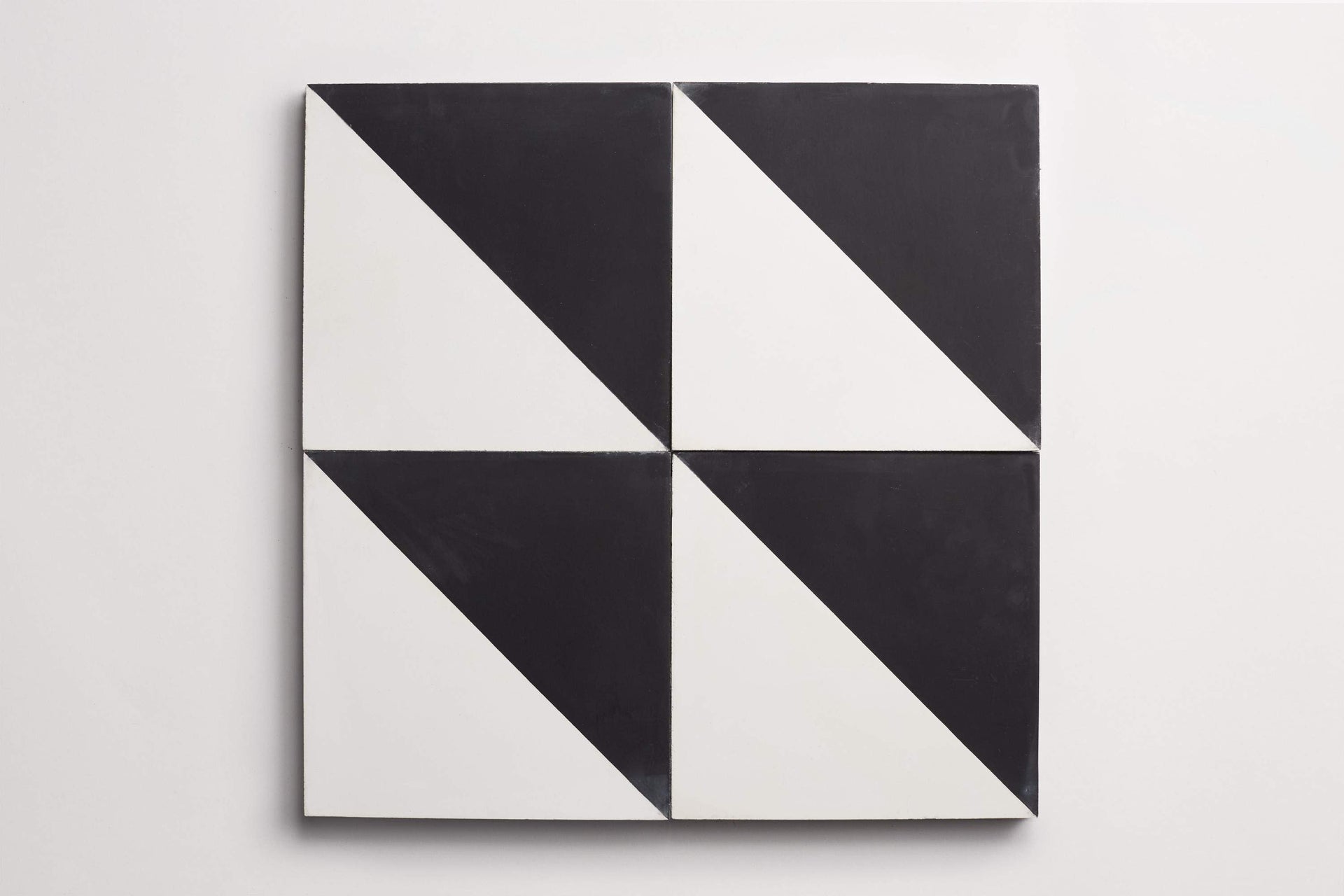 clé tile | concrete cement | bold slant triangle | black white
