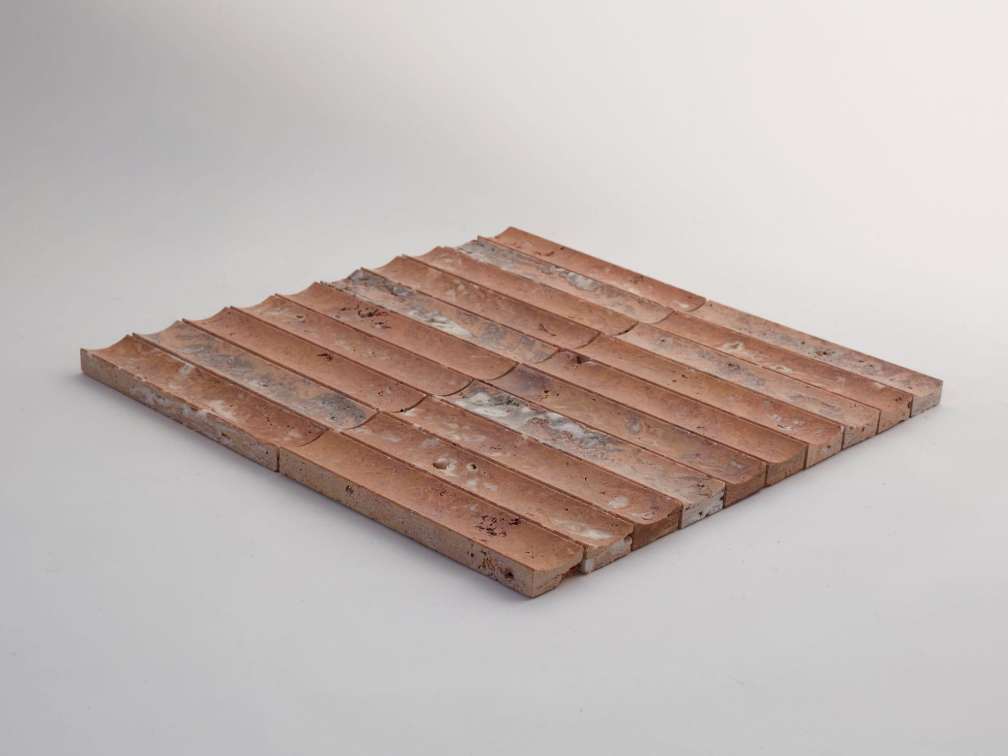 red travertine | fluted 3d-tile | etui petit lapidary | clé – clé tile